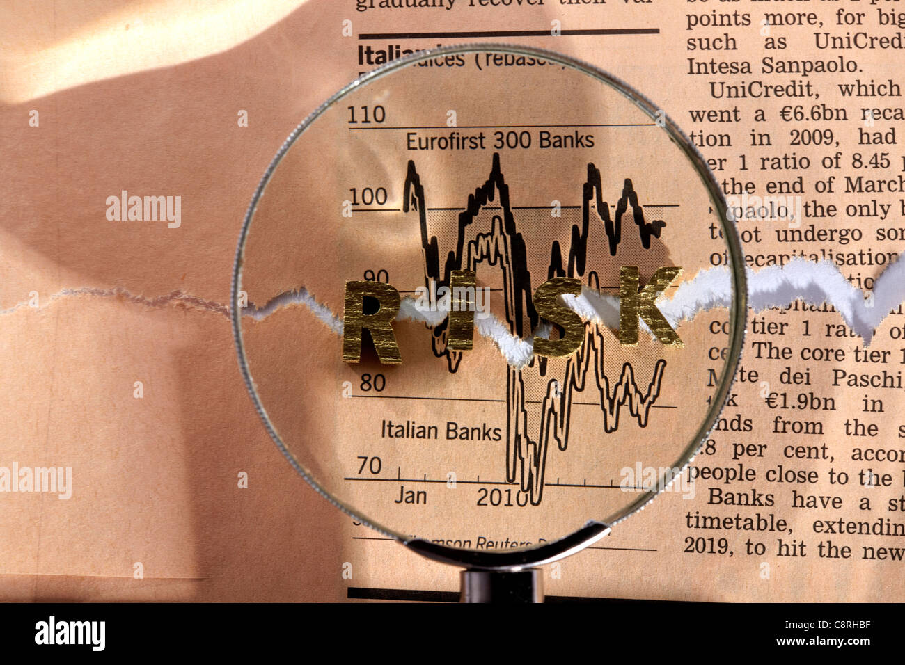 Close-up Of Magnifying Glass With The Newspaper Article Stock Photo - Alamy