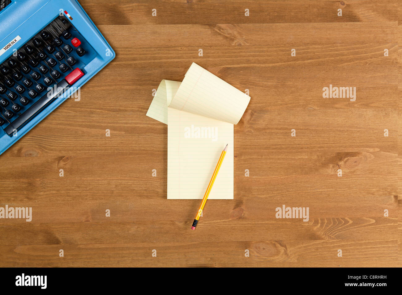 High Angle View Of The Notepad And The Typewriter At The Corner Stock ...