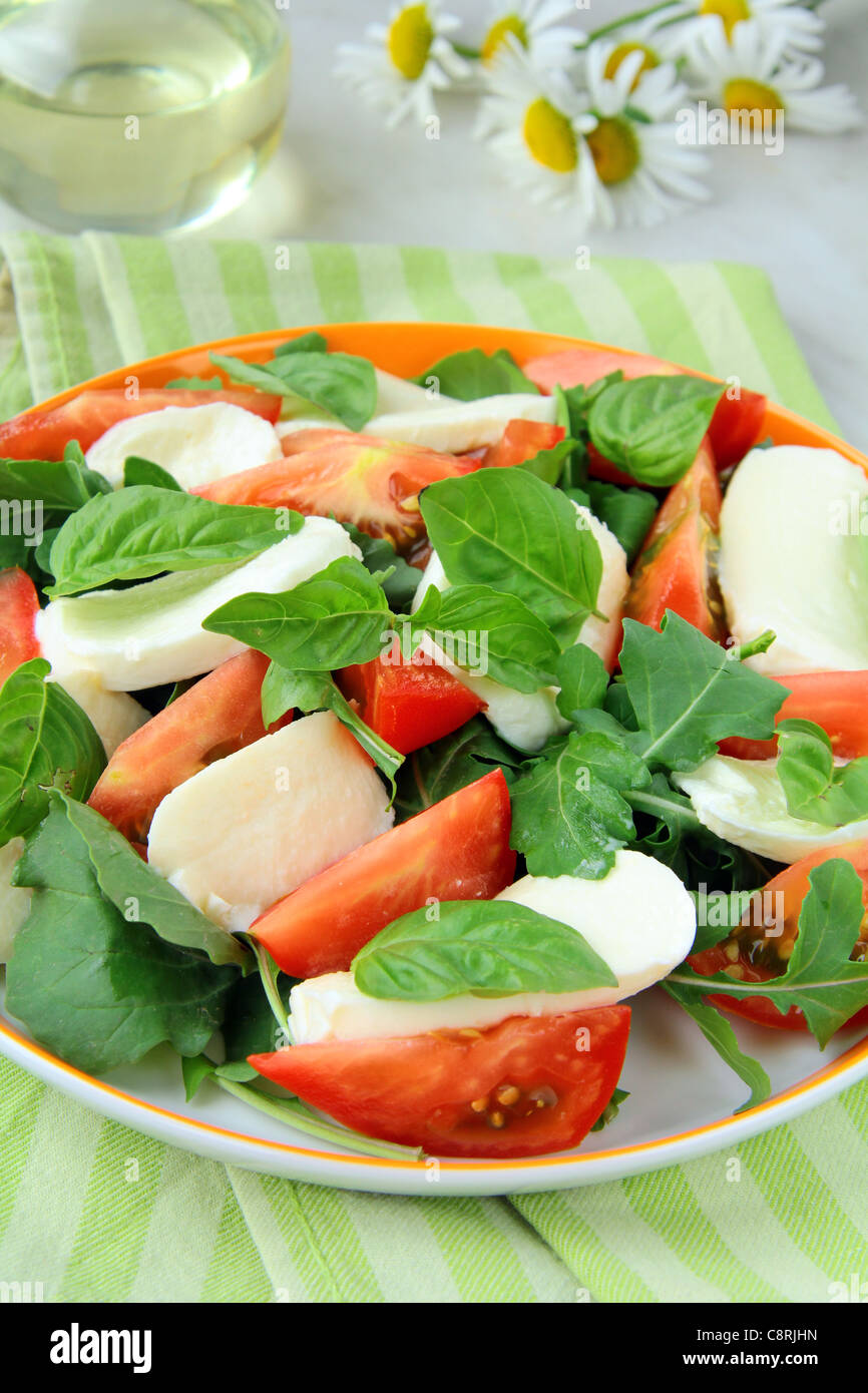 Traditional Italian Caprese Salad mozzarella with tomatoes and basil ...