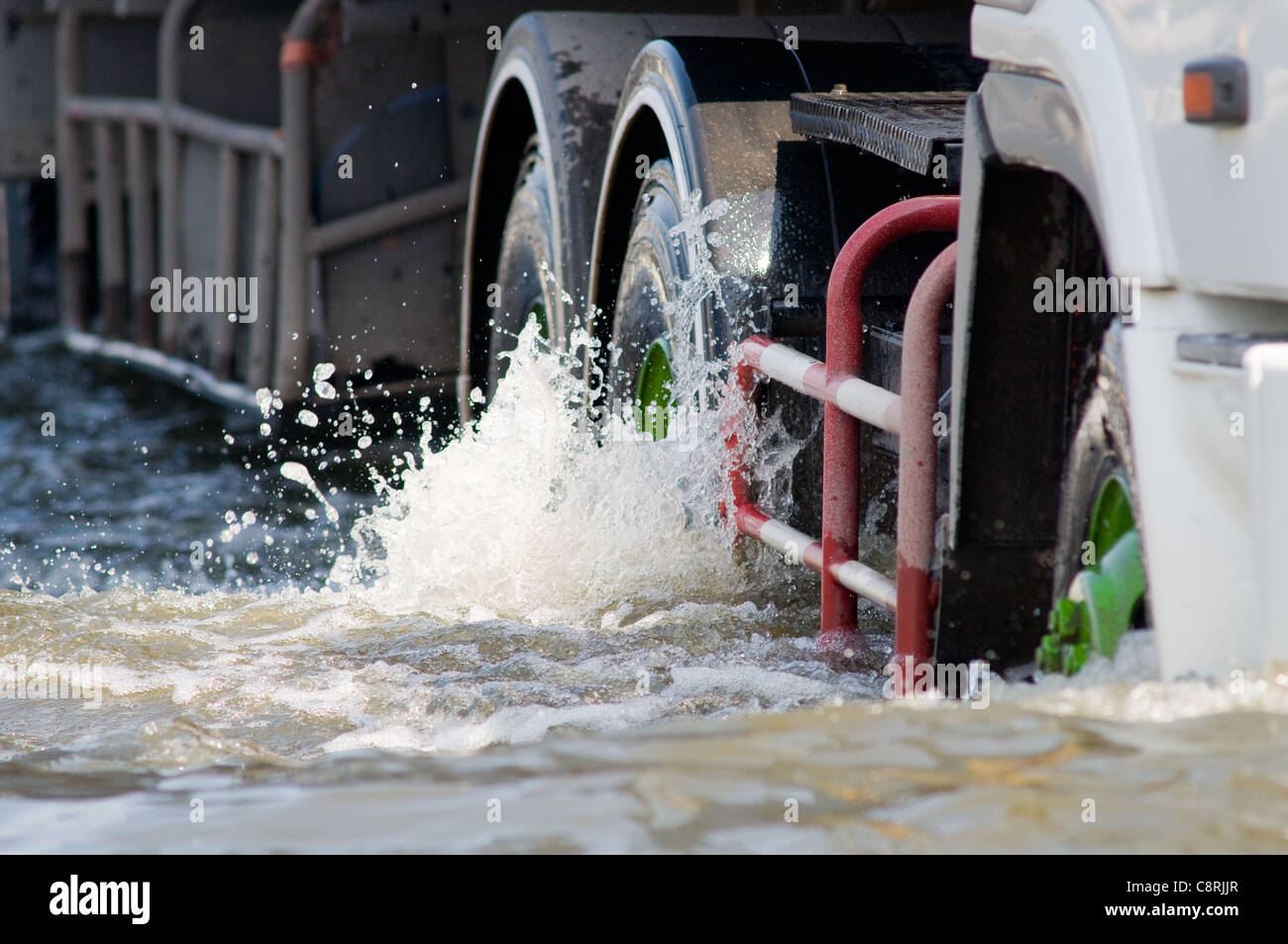Water truck spraying water hi-res stock photography and images - Alamy