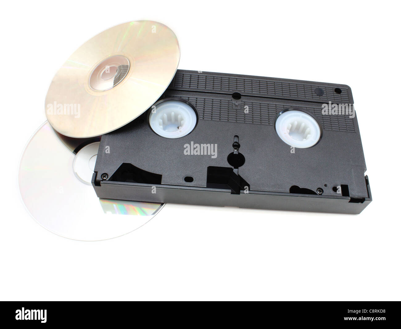 DVD disks and VHS video the cartridge on a white background in time and ...