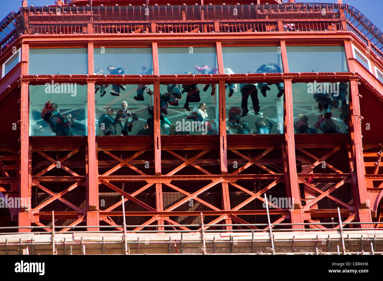 People walking on the glass floor skywalk of The Blackpool Eye, part of ...