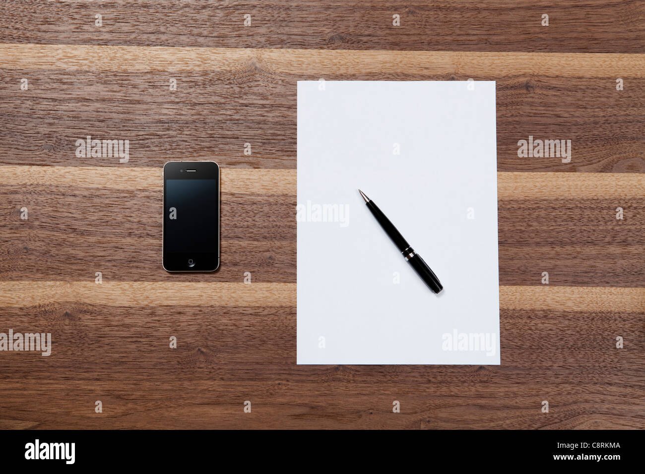 Mobile With Paper And Pen Stock Photo - Alamy