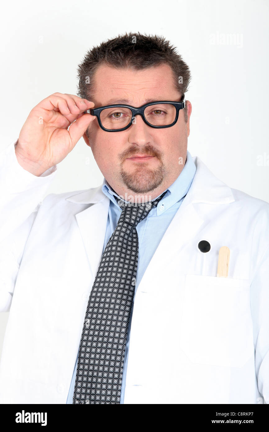 doctor putting on his glasses Stock Photo - Alamy