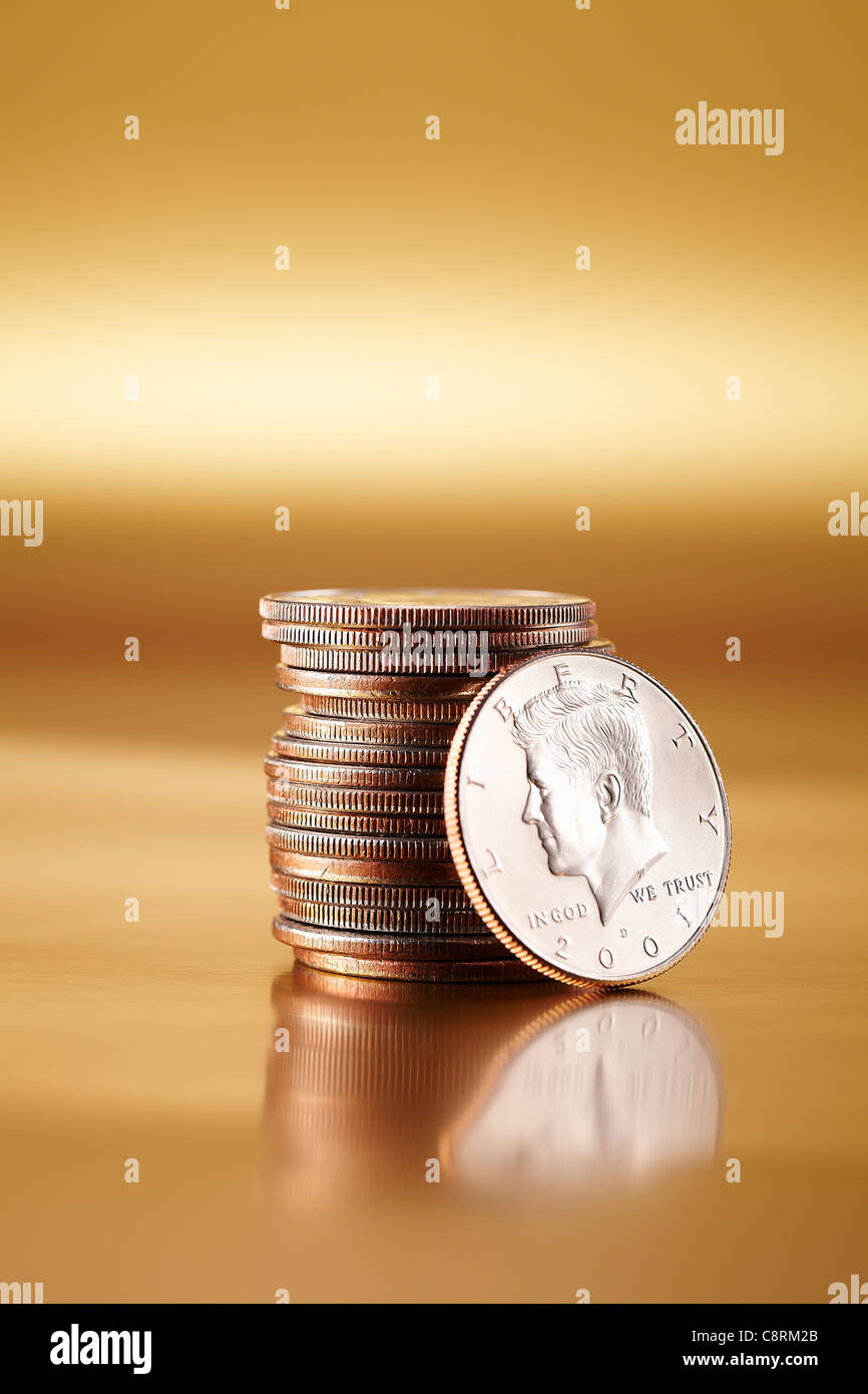 Stack of coin showing portrait of president Stock Photo - Alamy