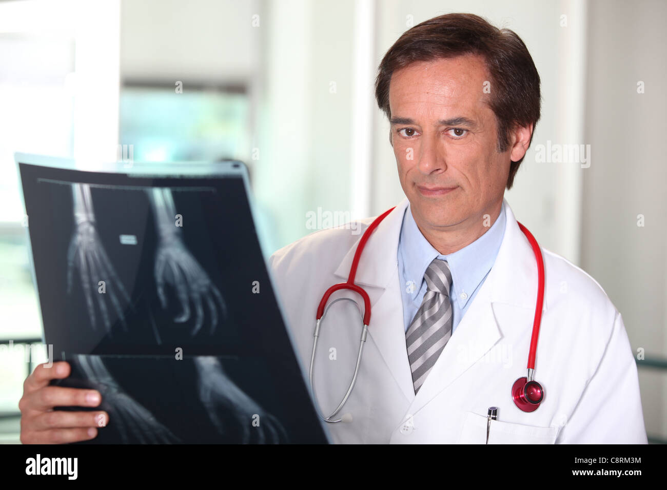 Doctor checking X-ray Stock Photo - Alamy