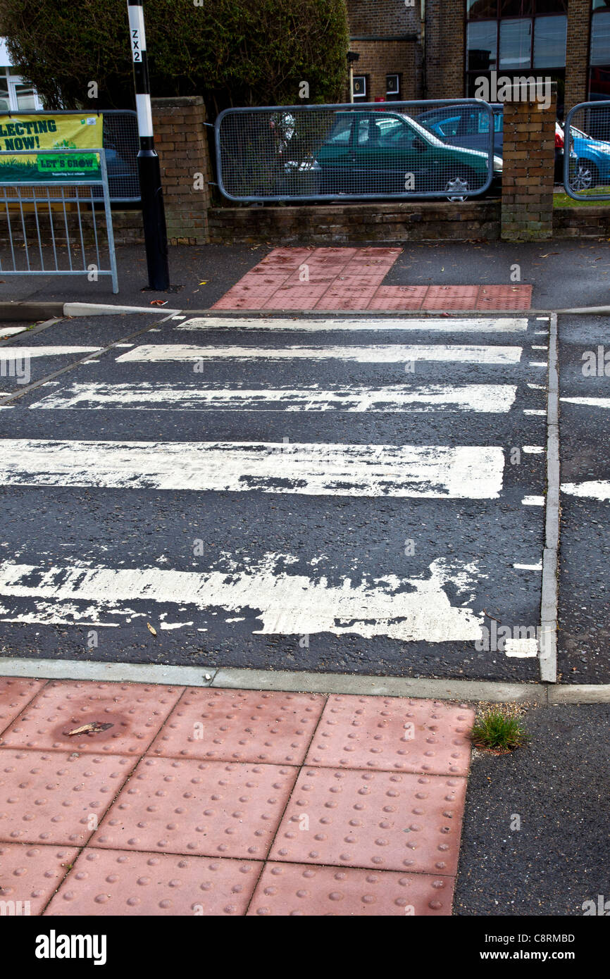 Zebra Crossing with Cars and School Building in Background Stock Photo ...