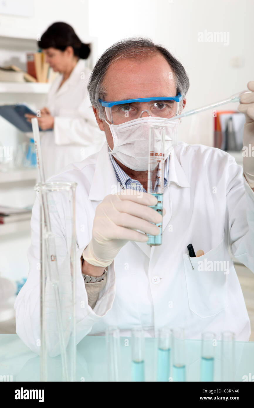 Carrying out quality control hi-res stock photography and images - Alamy