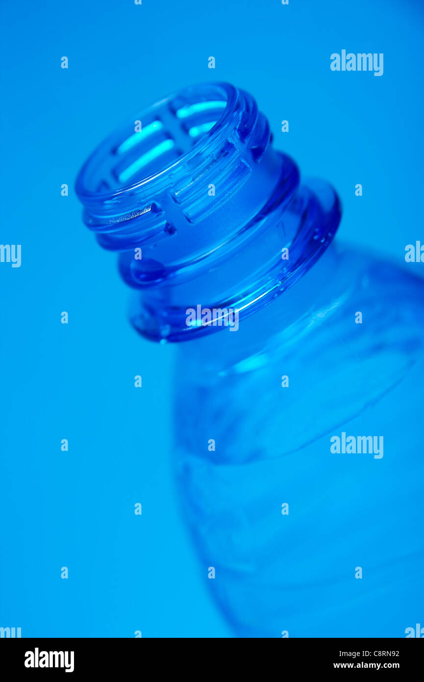 Neck of a plastic bottle in blue Stock Photo - Alamy