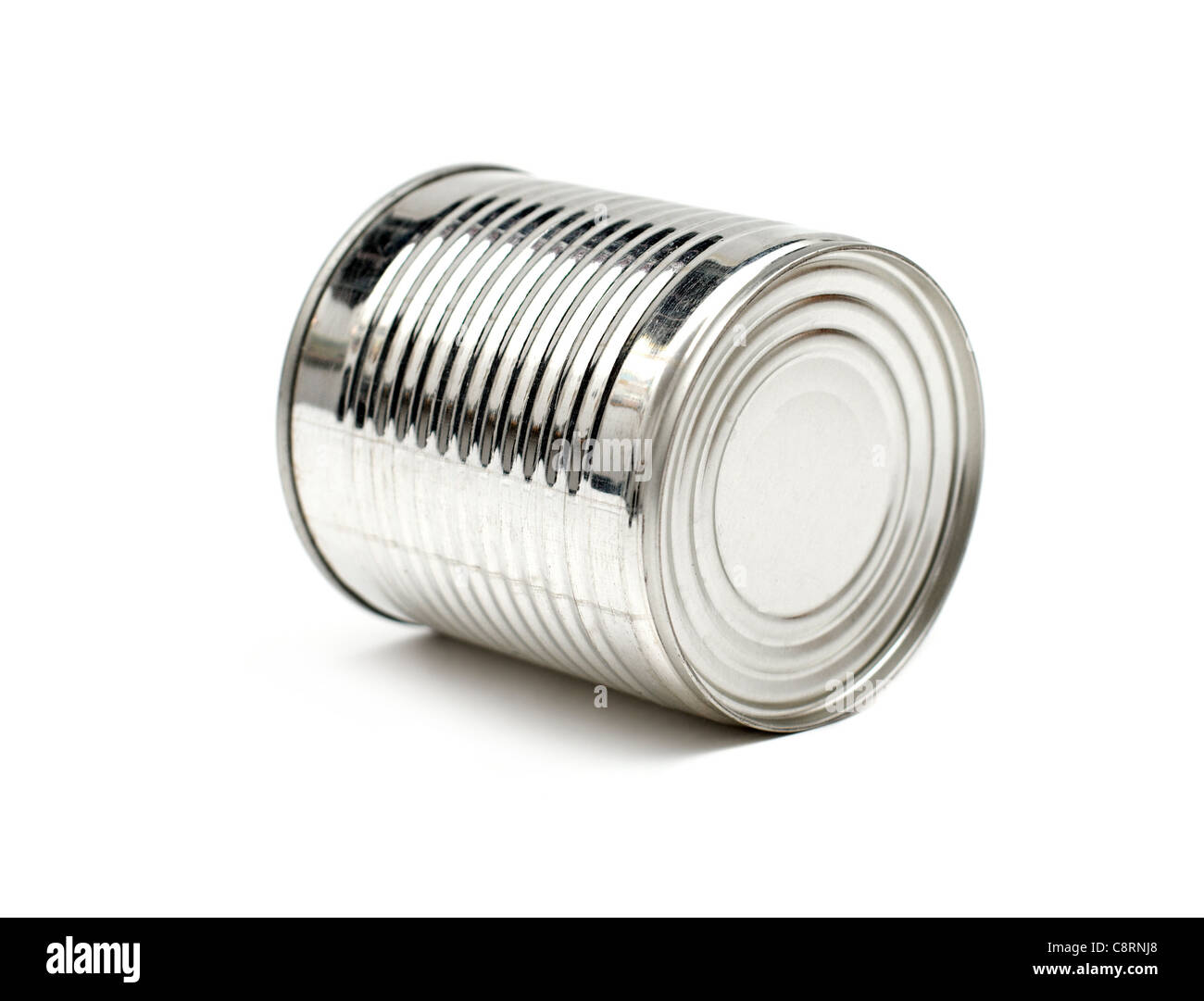 Shiny tin isolated on white Stock Photo - Alamy