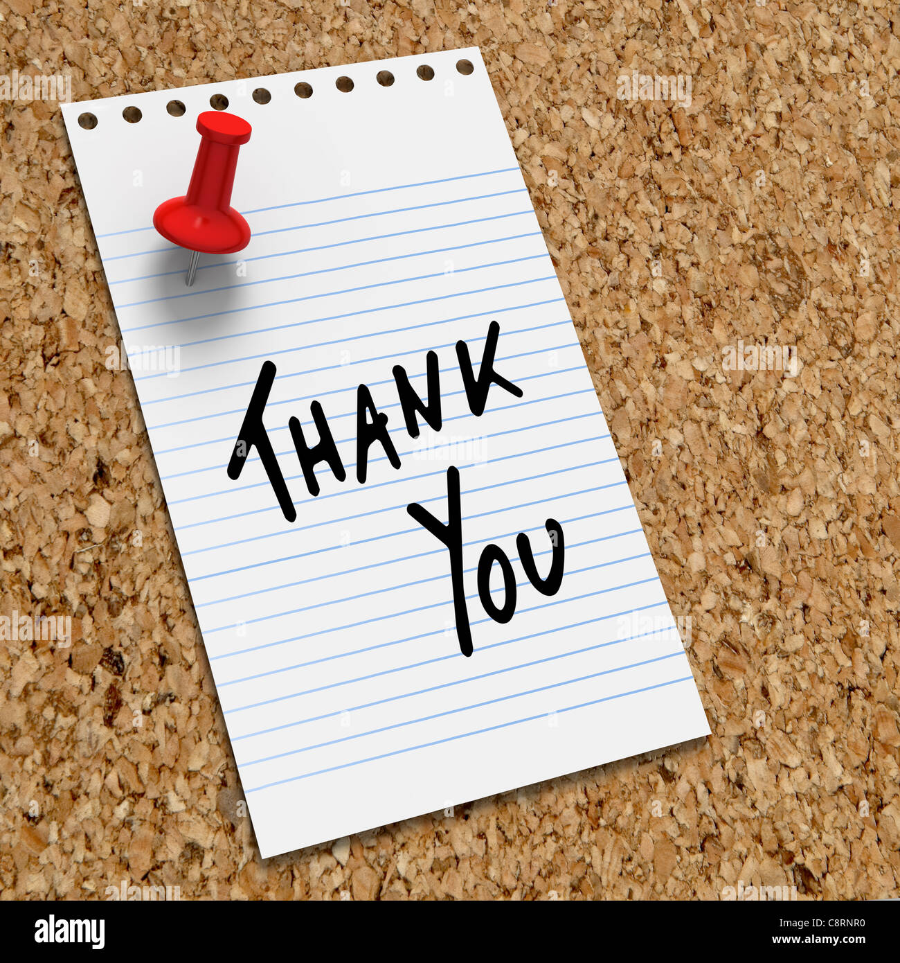 Lined notepaper with thank you message with red push pin on cork board ...