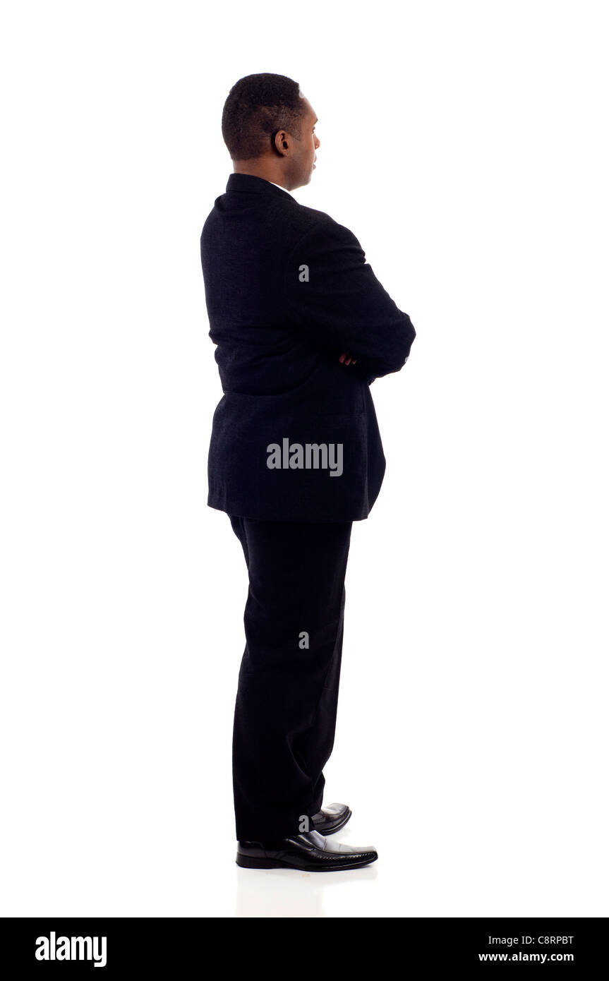 African American business man from the back looking at something ...