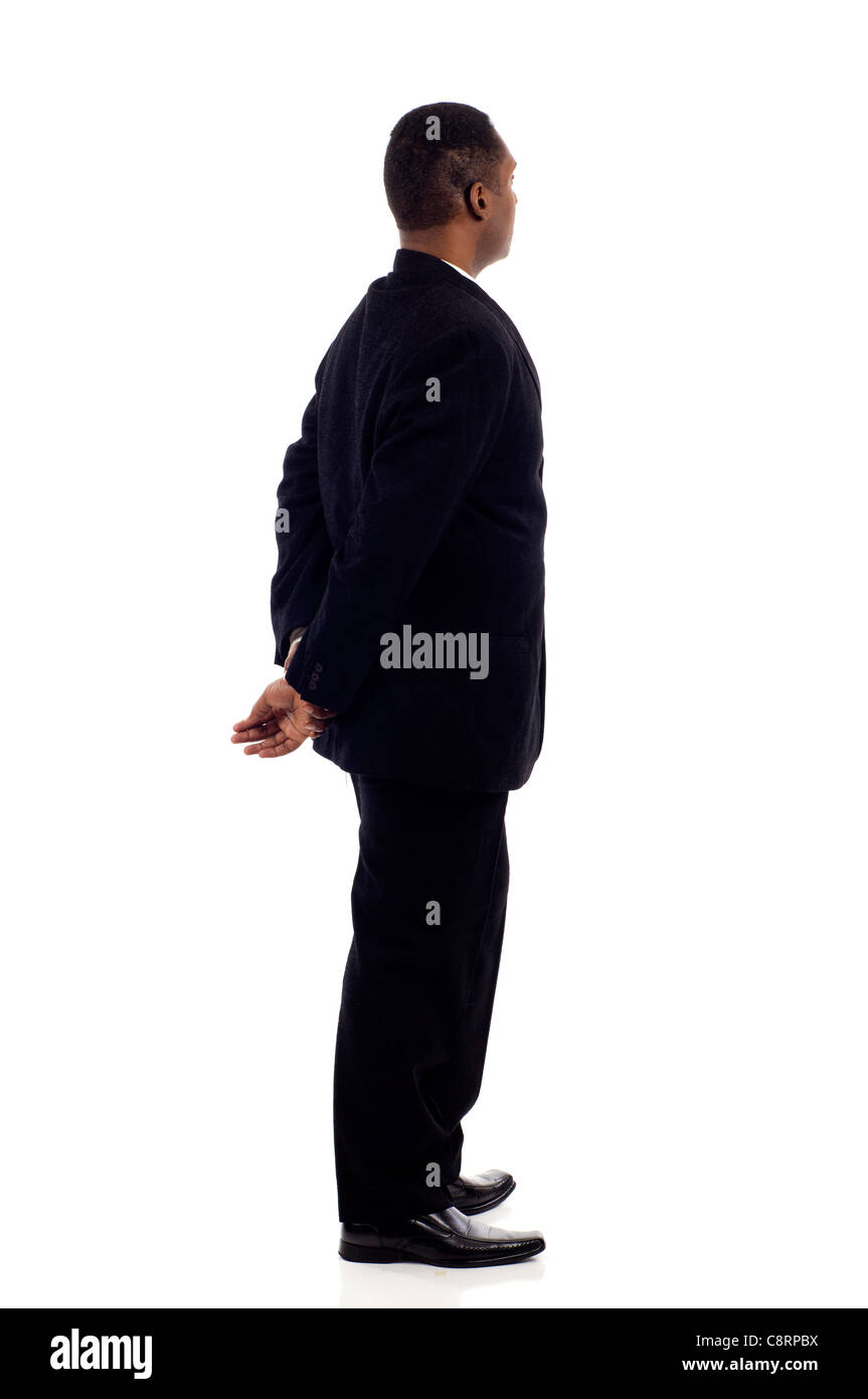 African American business man from the back looking at something ...