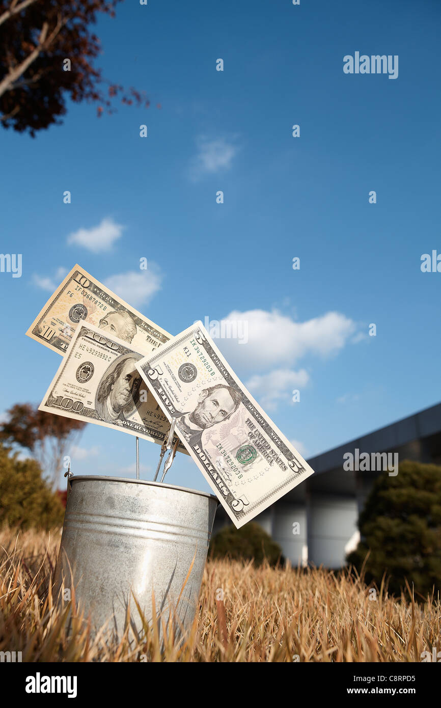 Bucket money hi-res stock photography and images - Alamy
