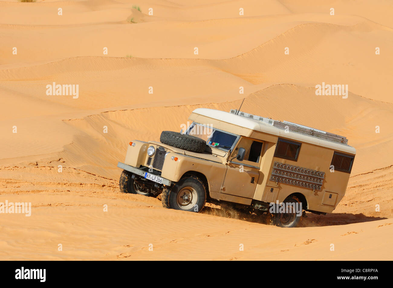 Africa, Tunisia, nr. Tembaine. Land Rover Series 2a camper van crossing ...
