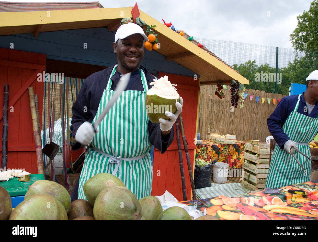 Coconut seller at the Newham town show 2011 Stock Photo - Alamy