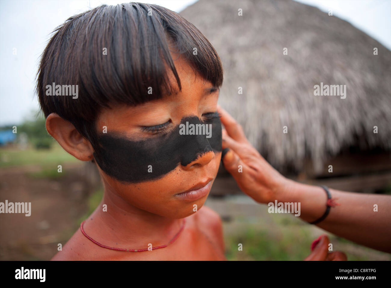 Xingu indians paint their body, Amazone, Brazil Stock Photo - Alamy