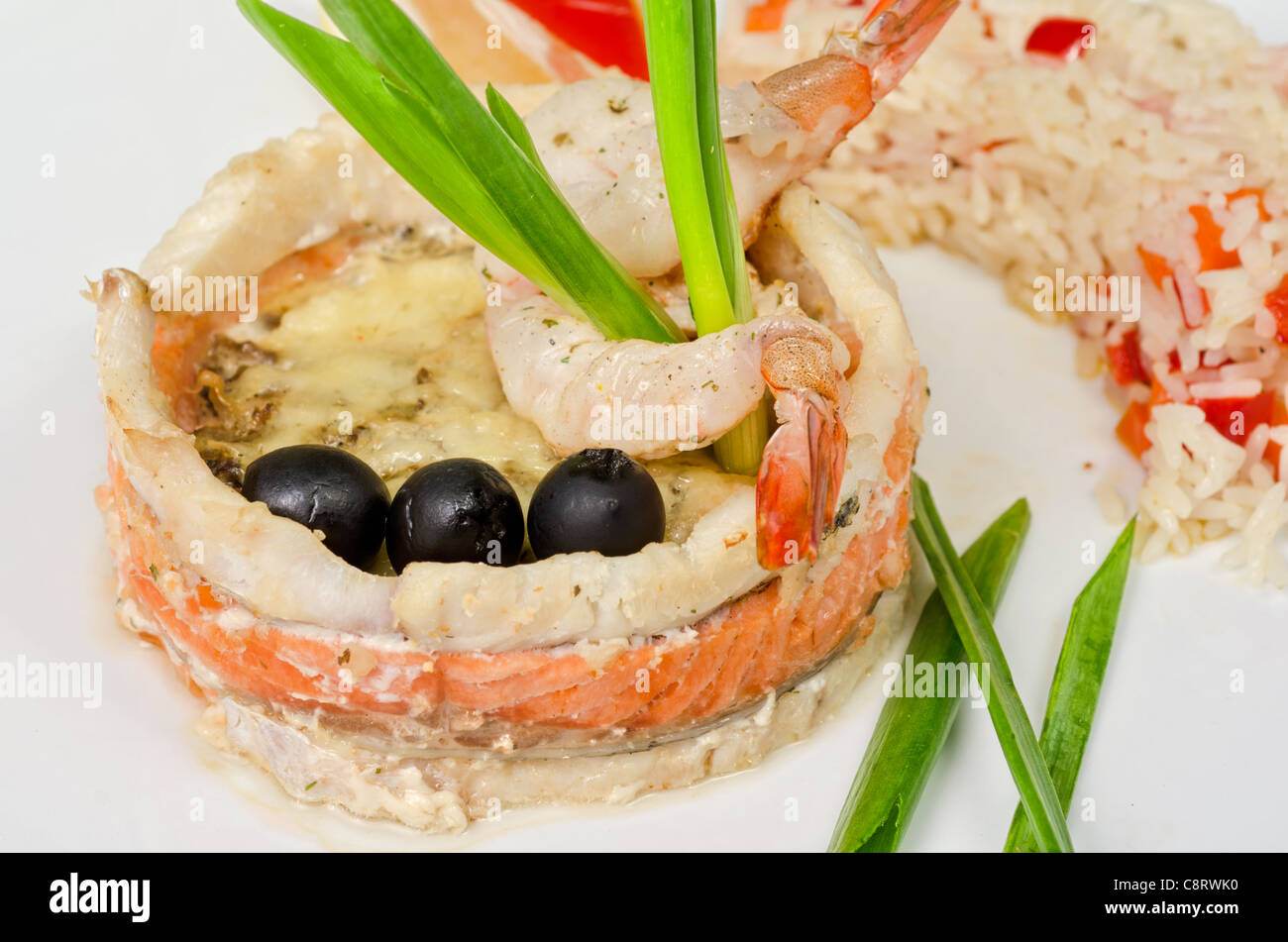 tasty prepared fish with rice and vegetables Stock Photo - Alamy