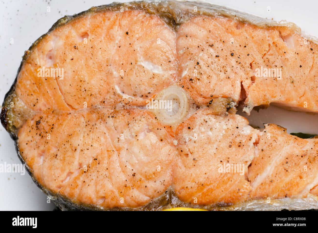 Closeup photo of grilled salmon fish - tasty dish Stock Photo - Alamy