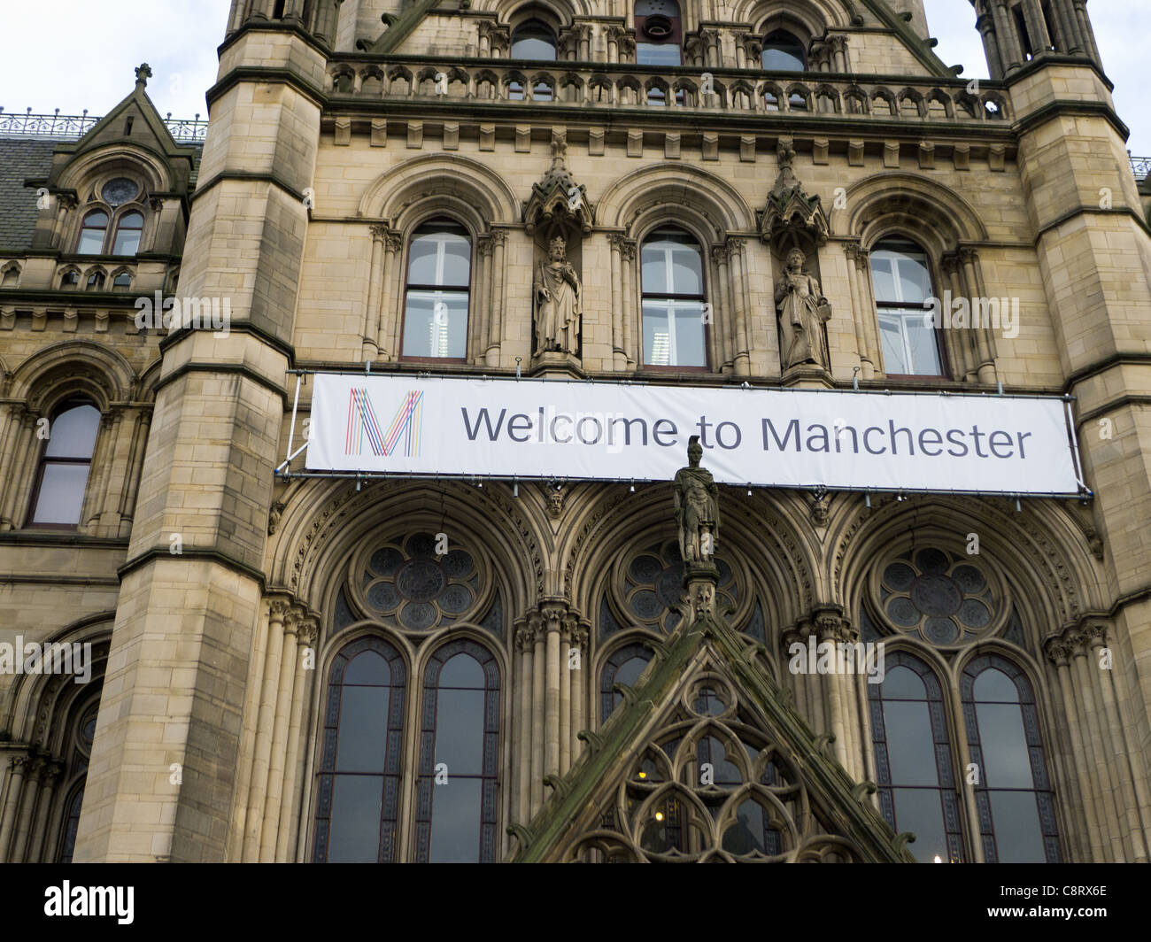 Welcome to Manchester banner on Manchester Town Hall Stock Photo - Alamy