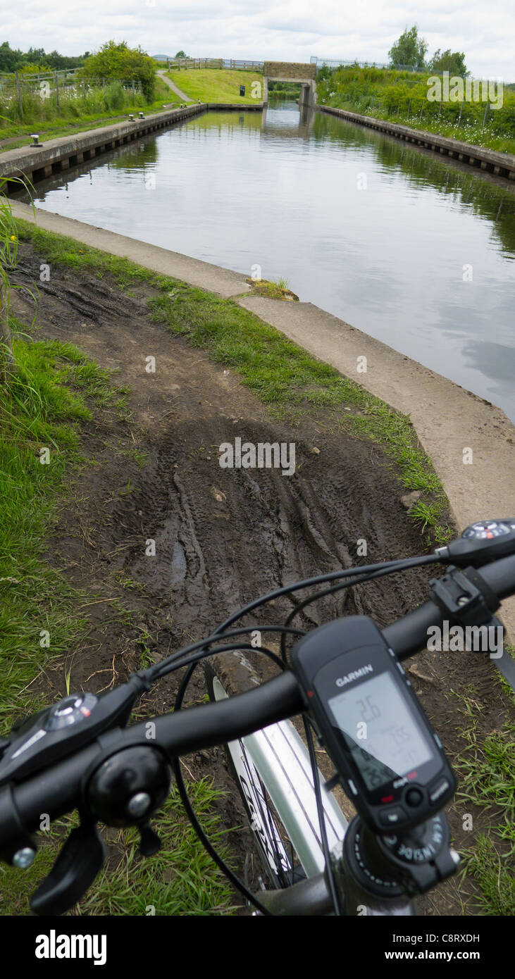 Cycling on towpath of Rochdale Canal, Lancashire Stock Photo - Alamy