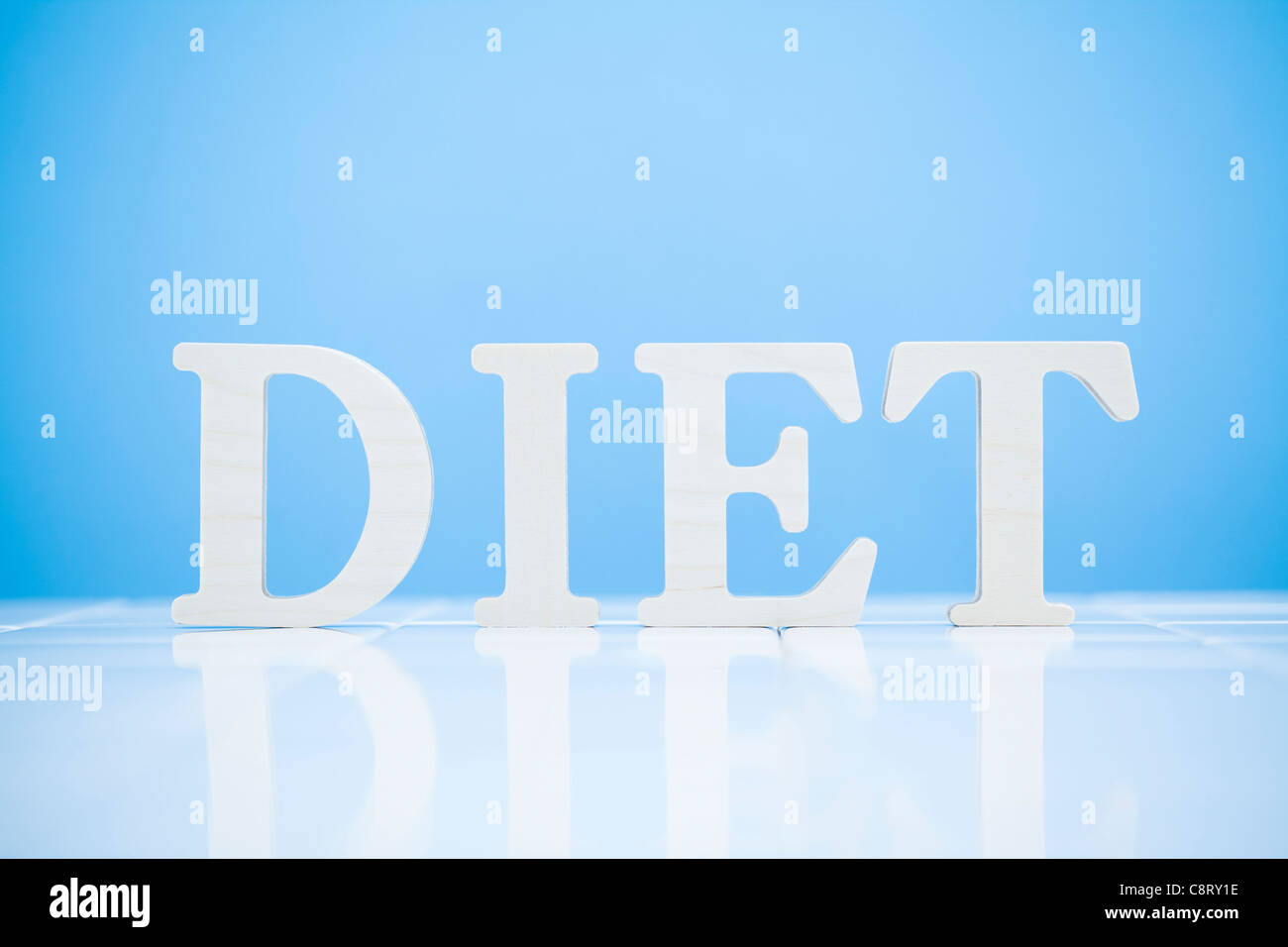 Close-up of text on floor with blue background Stock Photo - Alamy