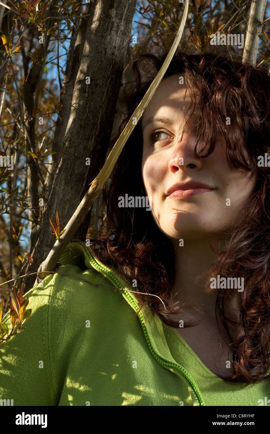 Woman between Branches Stock Photo - Alamy