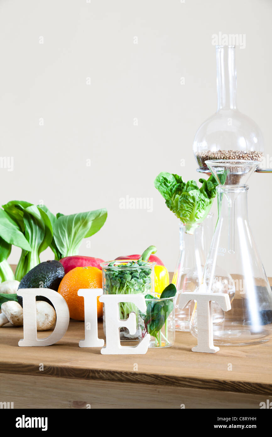 Diet near vegetables in a laboratory Stock Photo - Alamy