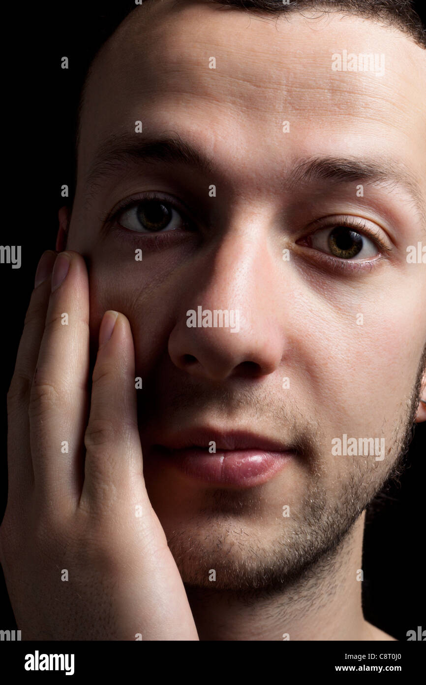 Man with Hand on His Face Stock Photo - Alamy