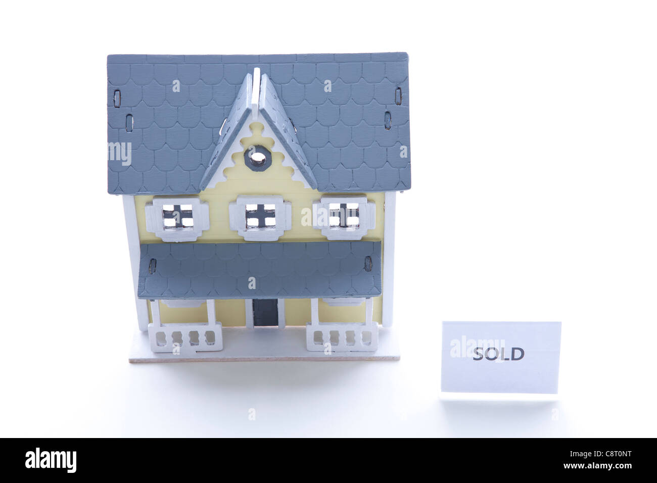 Model of house with sold sign on its sign, high angle view Stock Photo ...