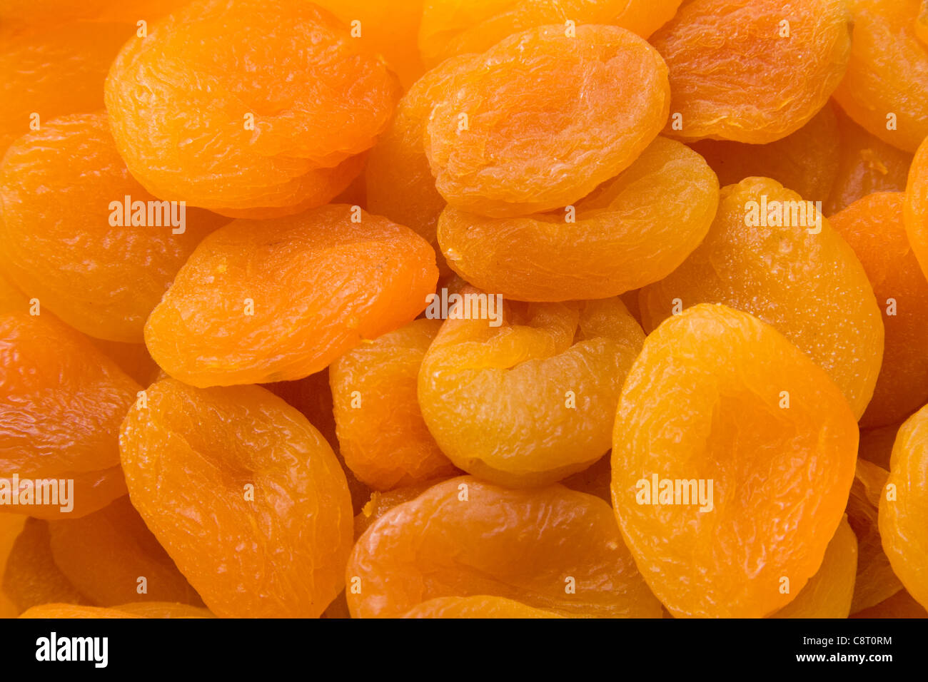 Dried apricot background Stock Photo - Alamy