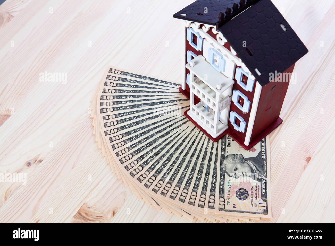 House Model With Currency Stock Photo - Alamy