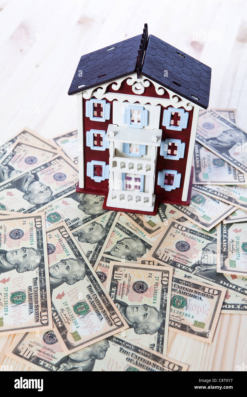 House Model With Currency Stock Photo - Alamy