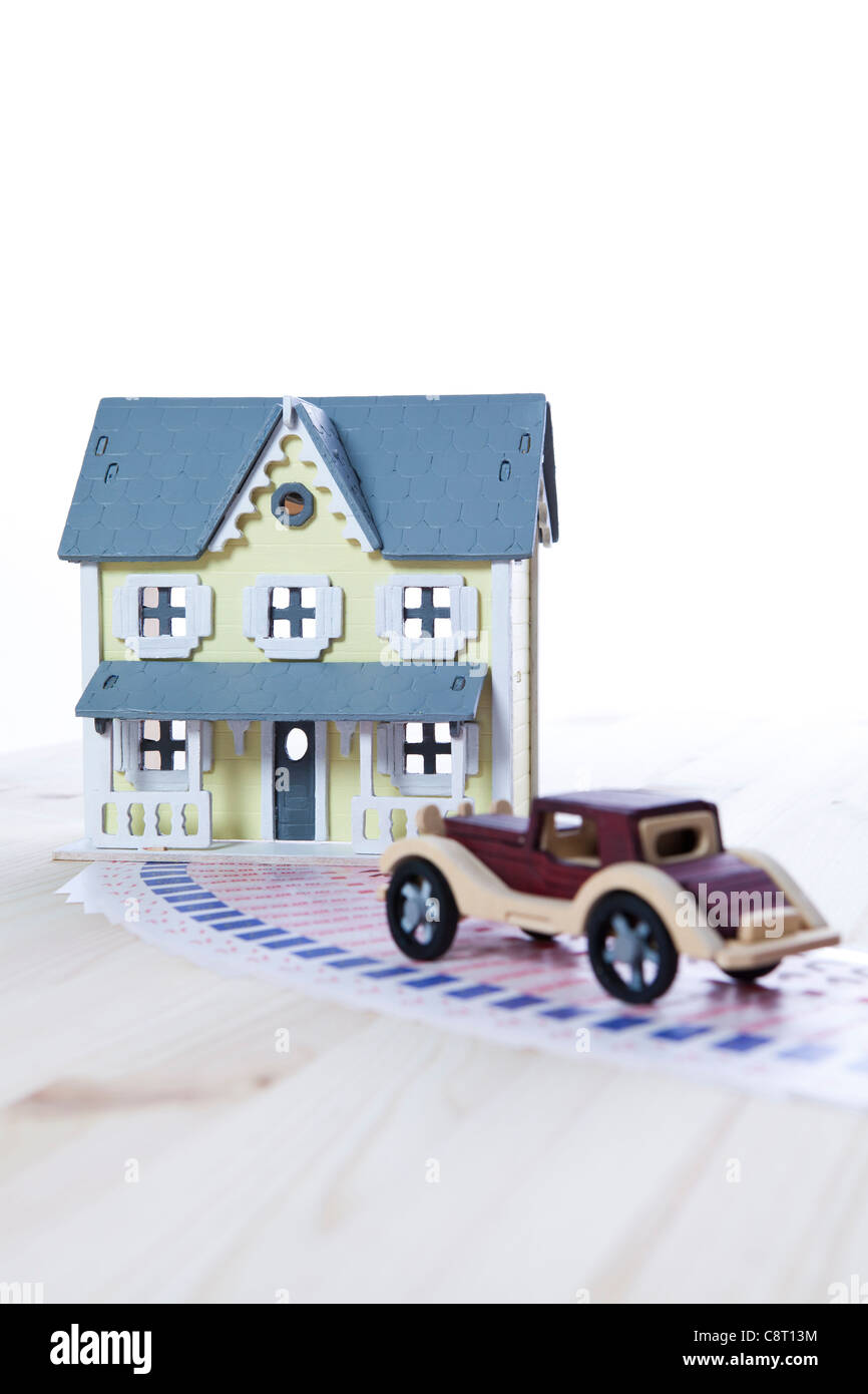 House Model With Car And Currency Stock Photo - Alamy