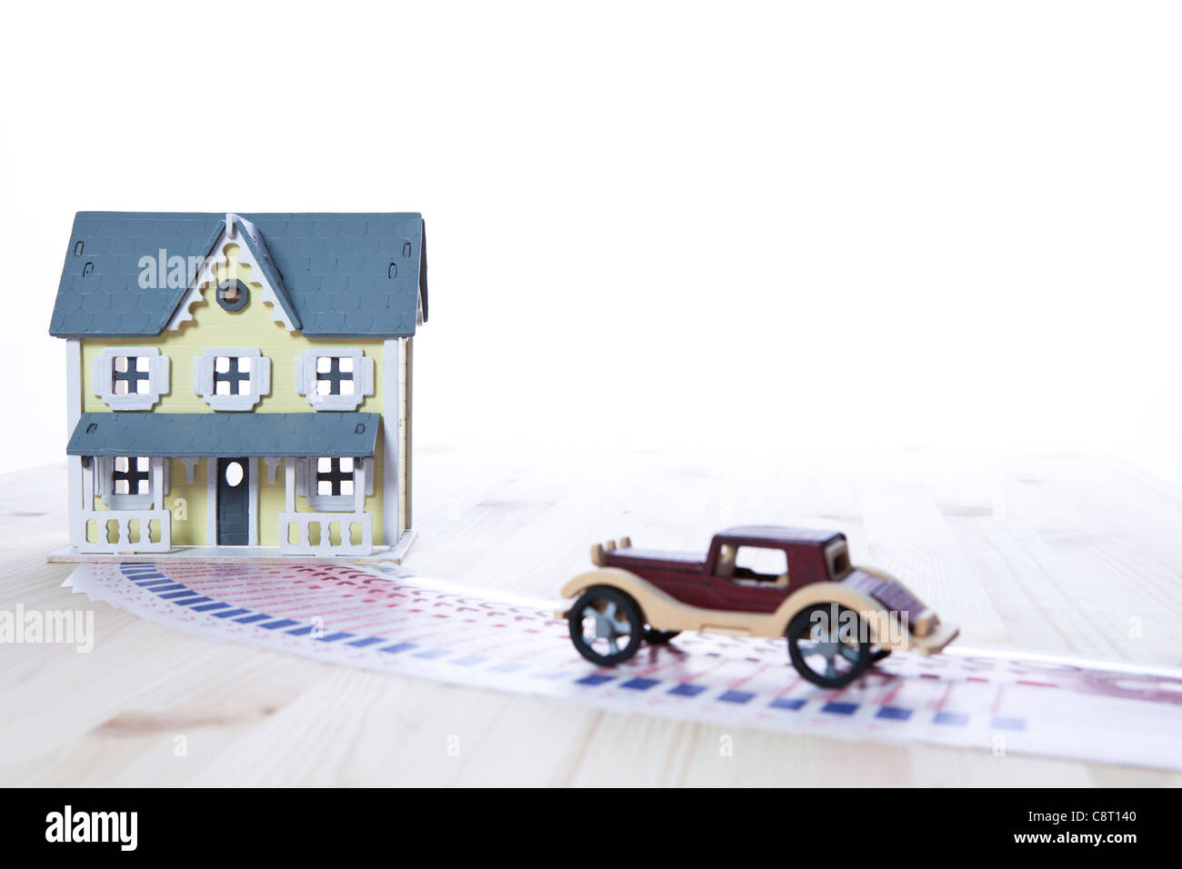House Model With Car And Currency Stock Photo - Alamy