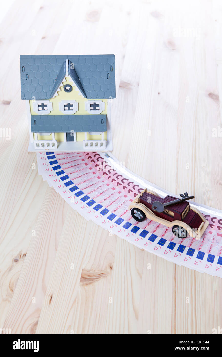 House Model With Car And Currency Stock Photo - Alamy