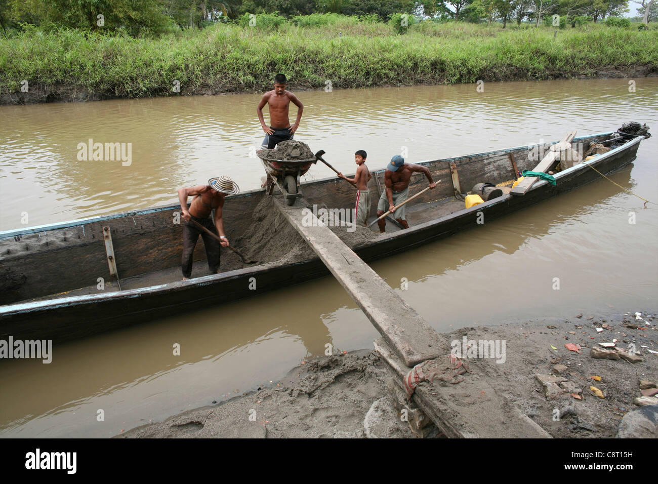 people dig sand from the bottom of the river Stock Photo - Alamy