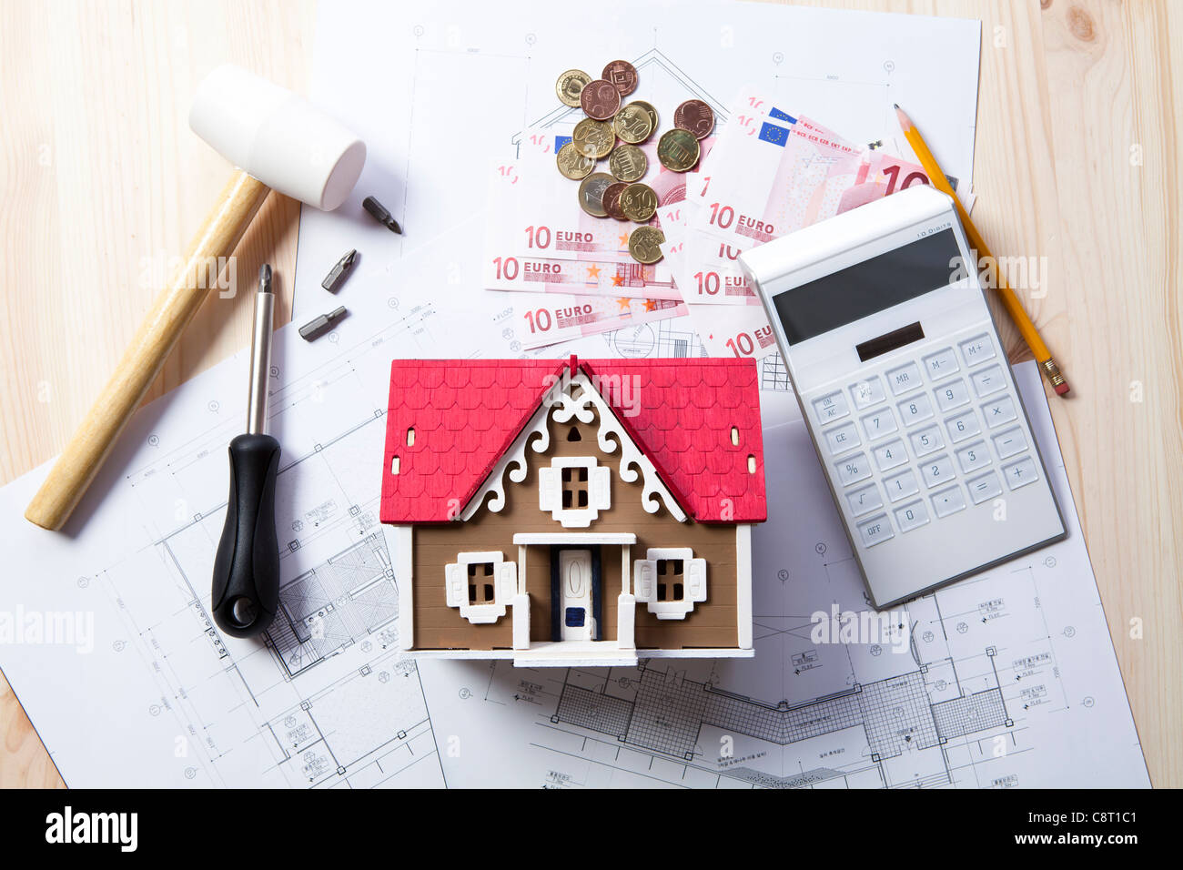 Carpentry Tools House Model And Calculator Stock Photo - Alamy