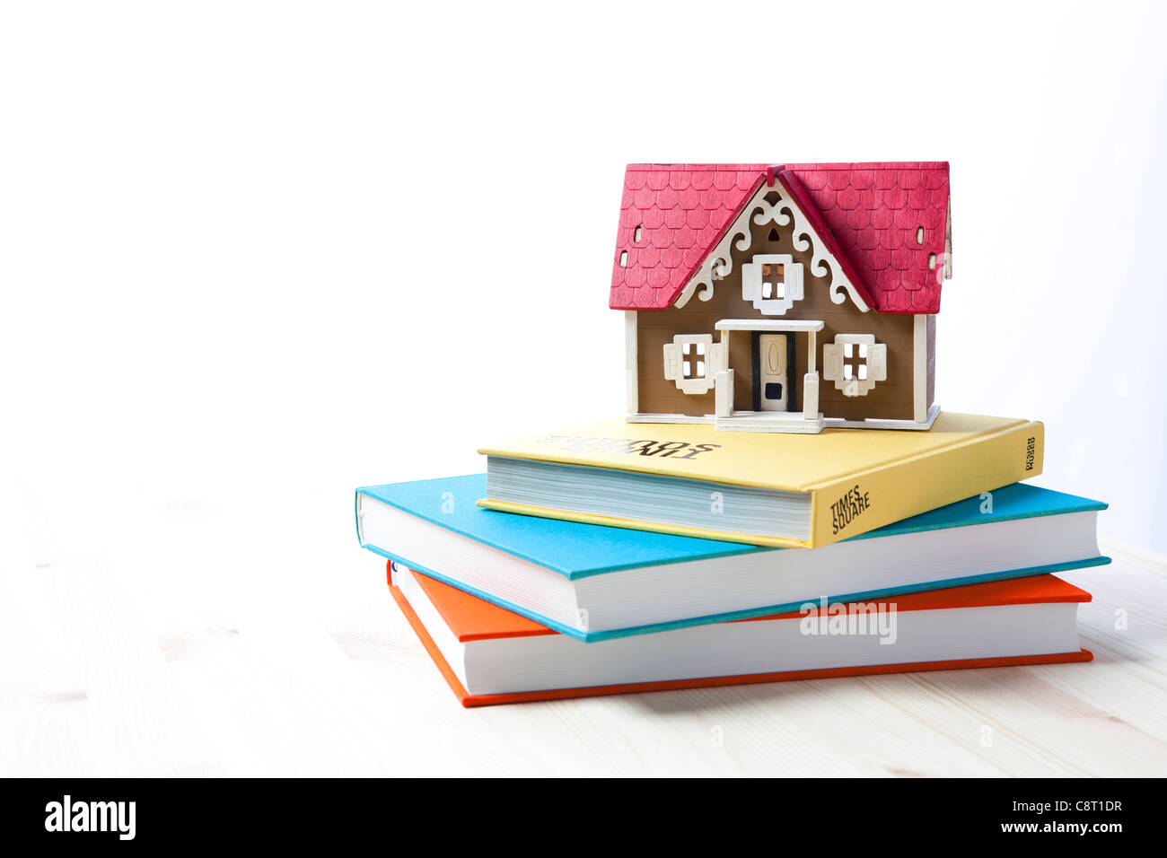 House Model And Books Stock Photo - Alamy