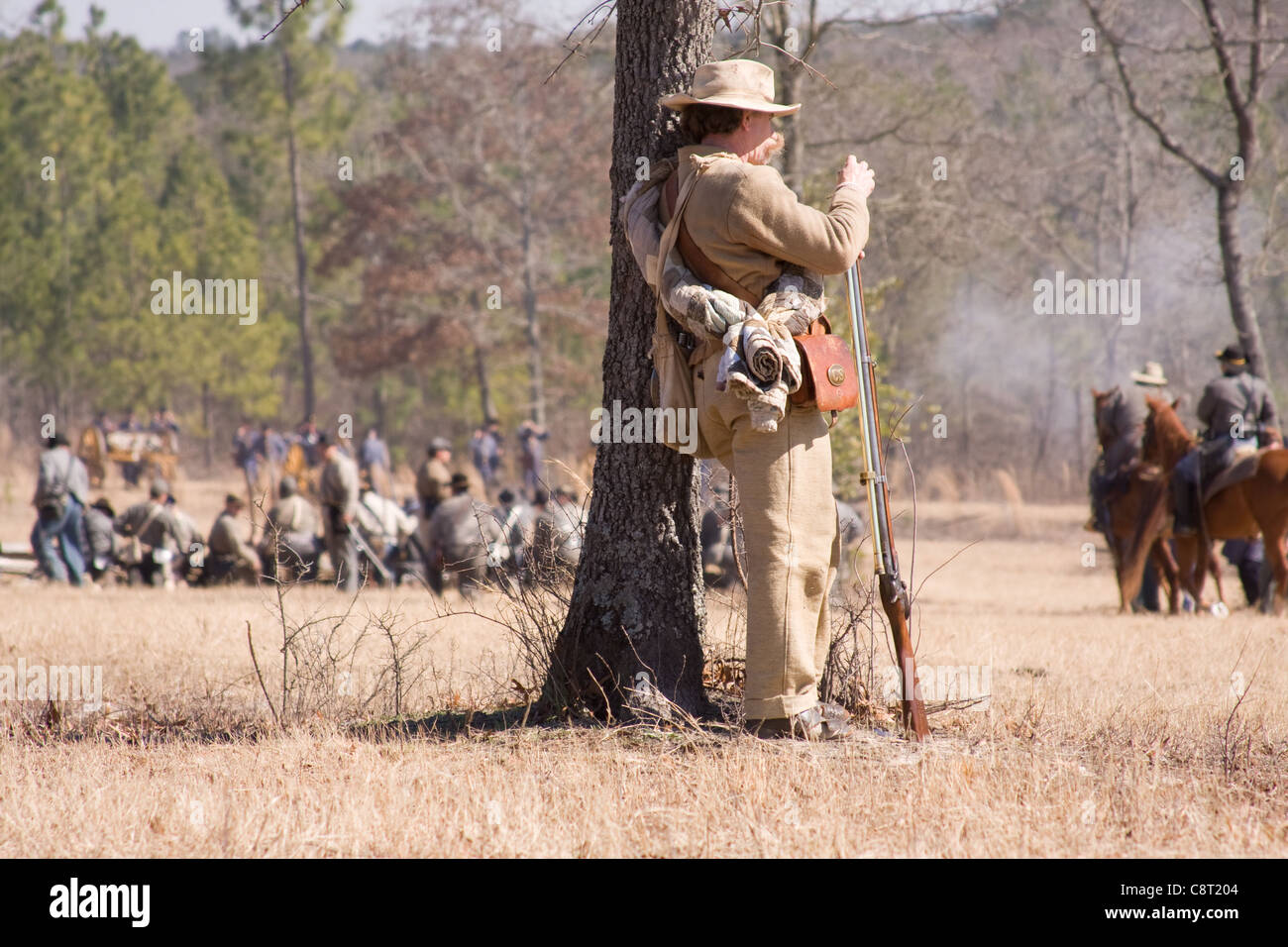 Revolutionary war scout watching the battle from behind a tree Stock ...