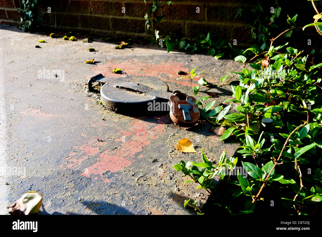 Unlocked lid of a domestic heating oil tank Stock Photo - Alamy