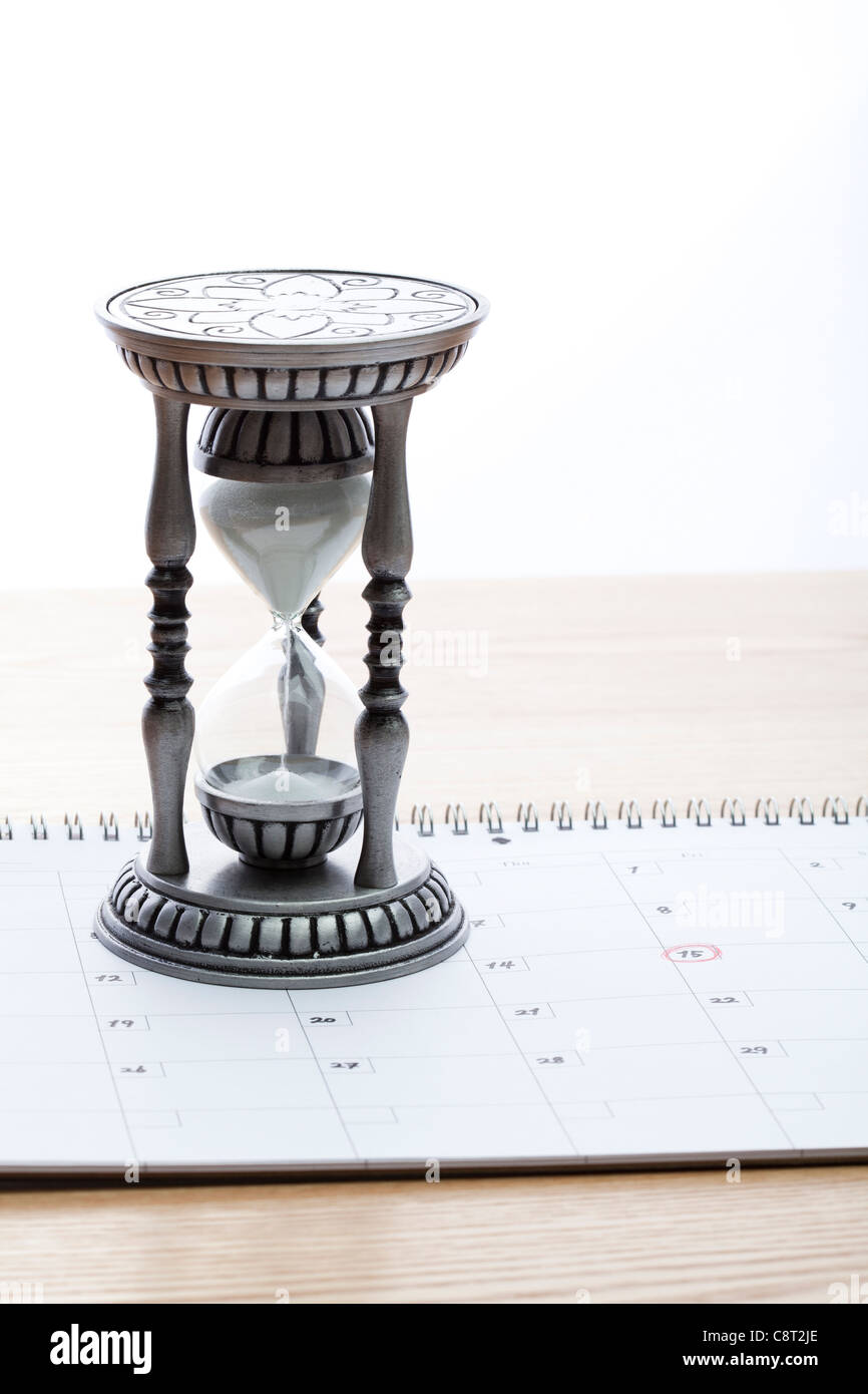 Calendar With Timer Glass Stock Photo - Alamy