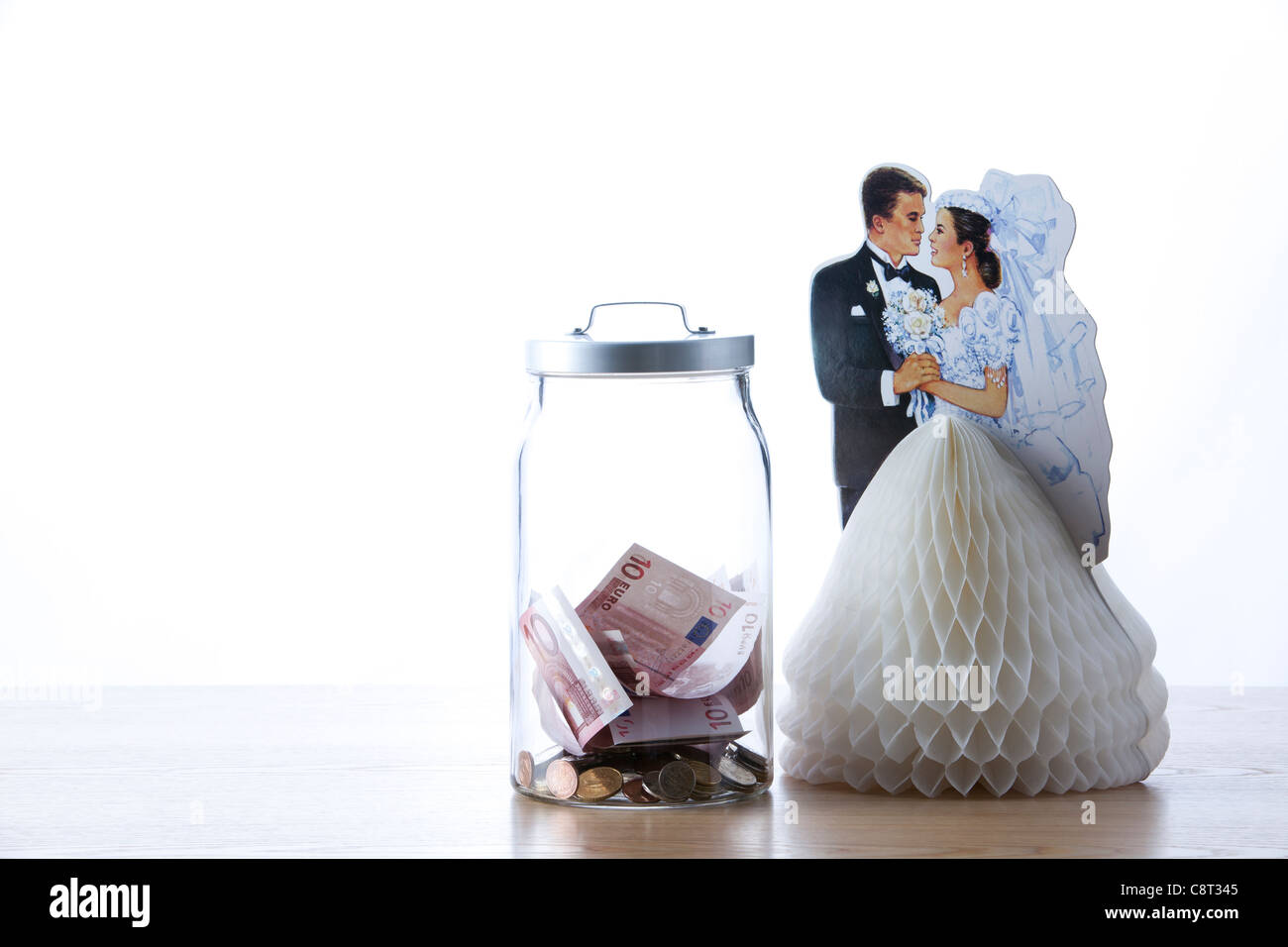 Currency Inside The Glass Jar Stock Photo - Alamy