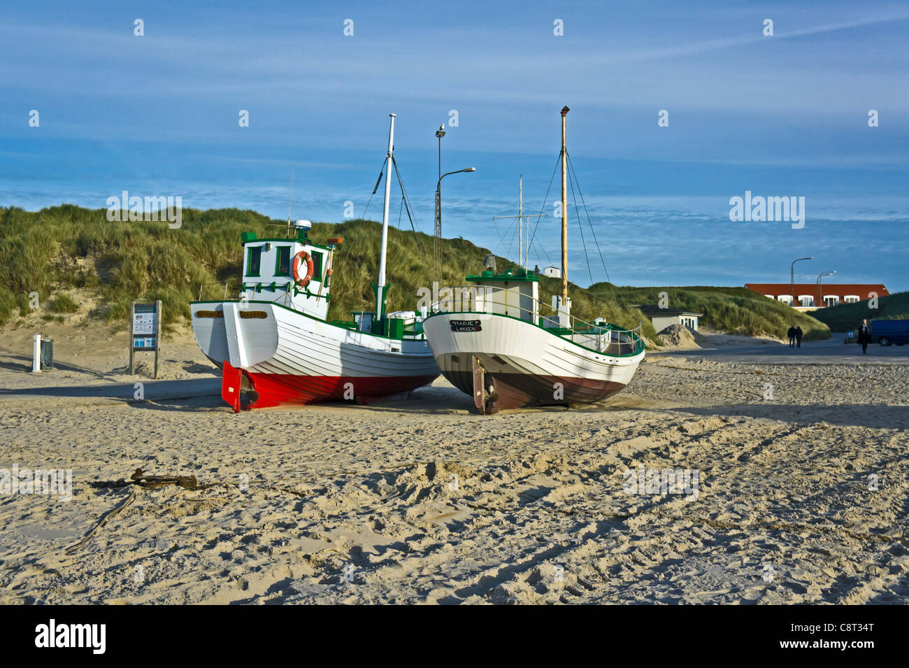 A lineup of two small Danish Fishing boats beached at Lokken in ...