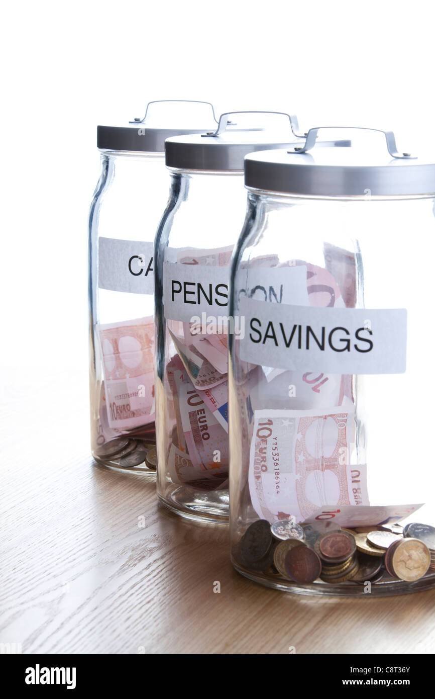 Currency Inside Three Jar Stock Photo - Alamy