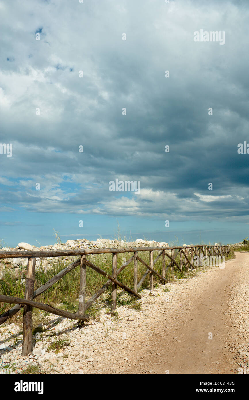 Country Road with Wooden Fence Stock Photo - Alamy
