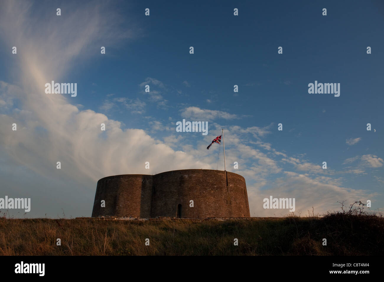 Clouds at dusk at the Slaughden Martello Tower, Aldeburgh, Suffolk ...