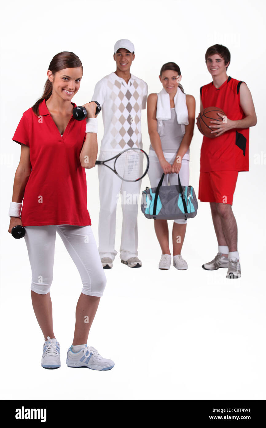 Four active teenagers Stock Photo - Alamy