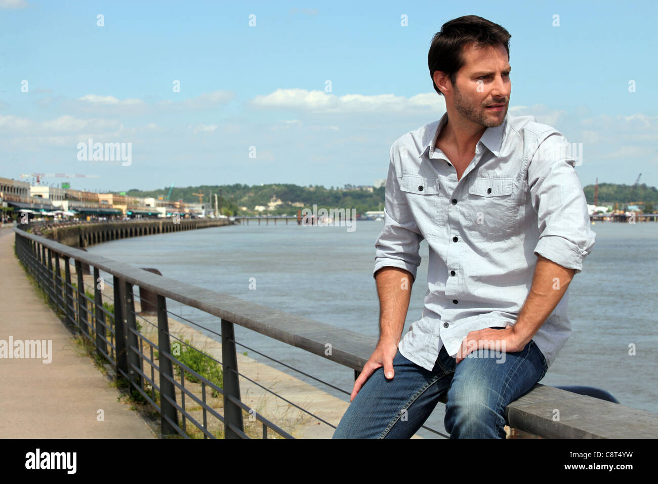 Man looking at river Stock Photo - Alamy