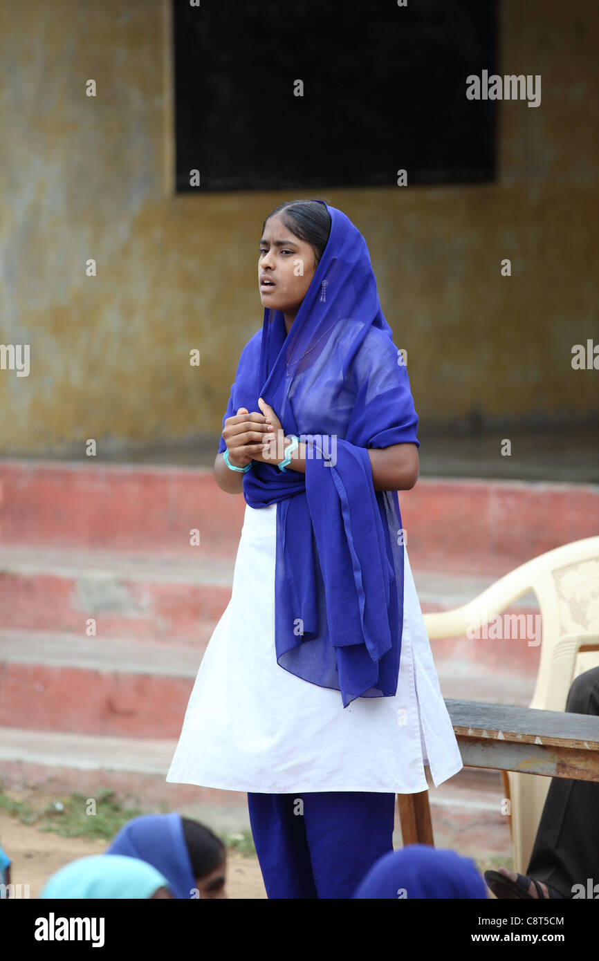 Muslim girl chanting at school Andhra Pradesh South India Stock Photo ...
